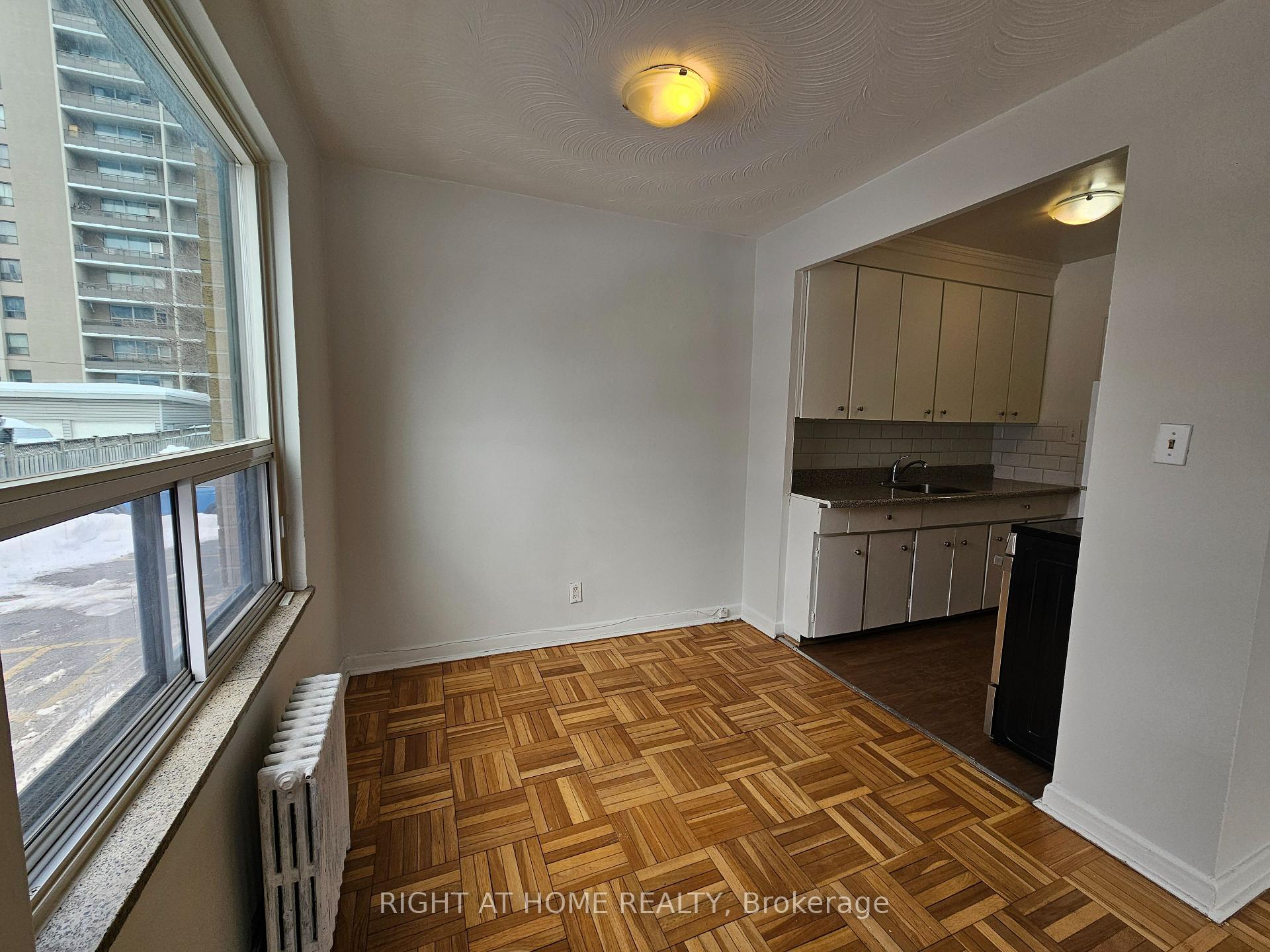 210 - 20 Cosburn Avenue, Toronto, ON M4K 2E7